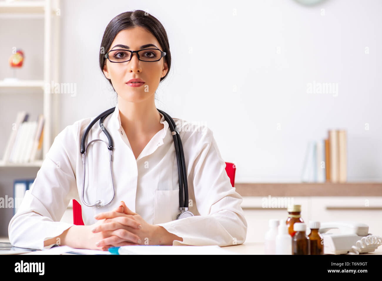 The woman doctor working in the hospital Stock Photo - Alamy