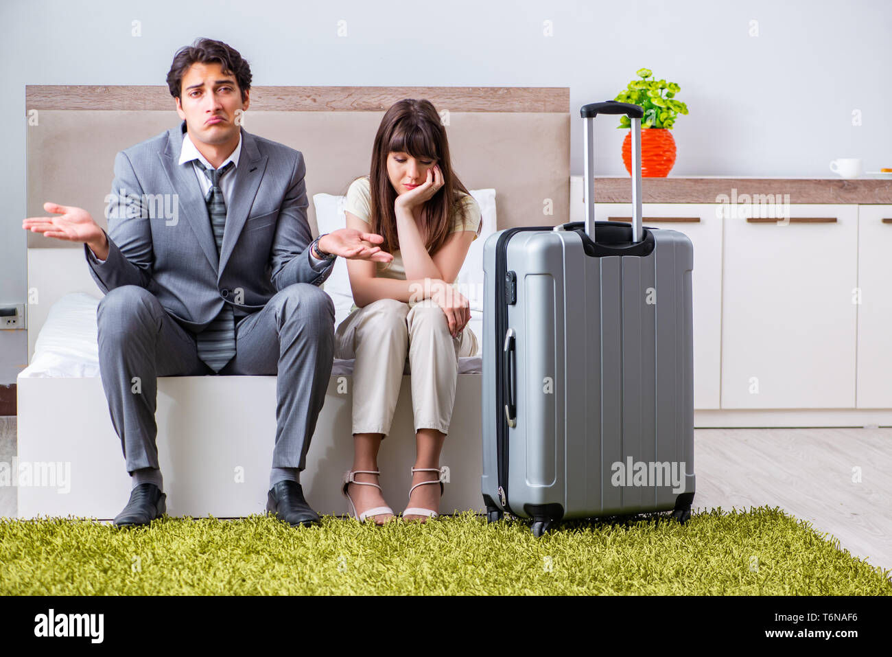 The wife seeing her husband off to business trip Stock Photo - Alamy