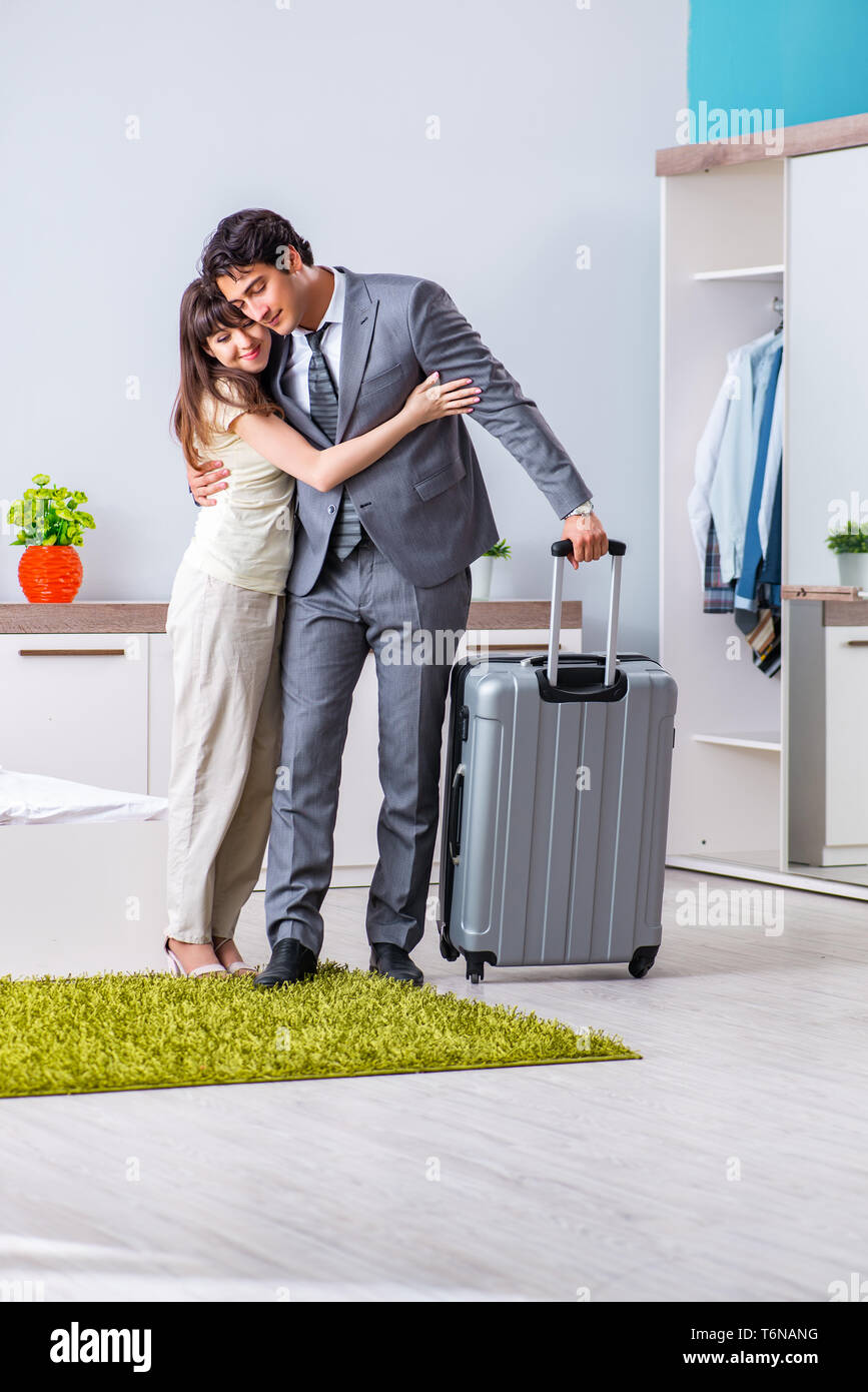 The wife seeing her husband off to business trip Stock Photo - Alamy