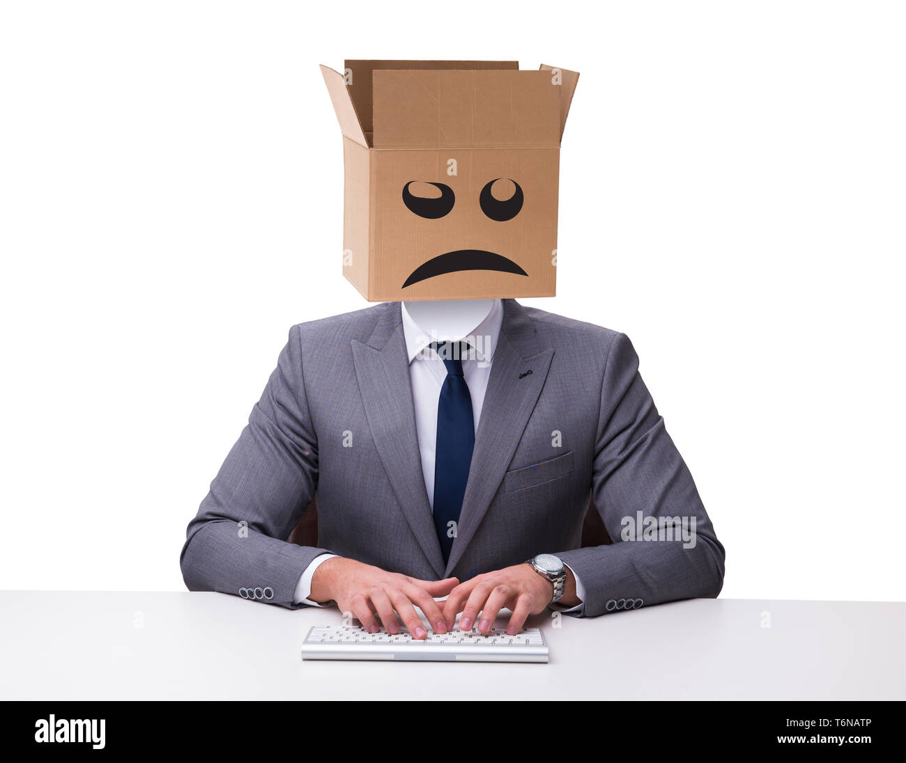 The businessman with box and unhappy face Stock Photo - Alamy