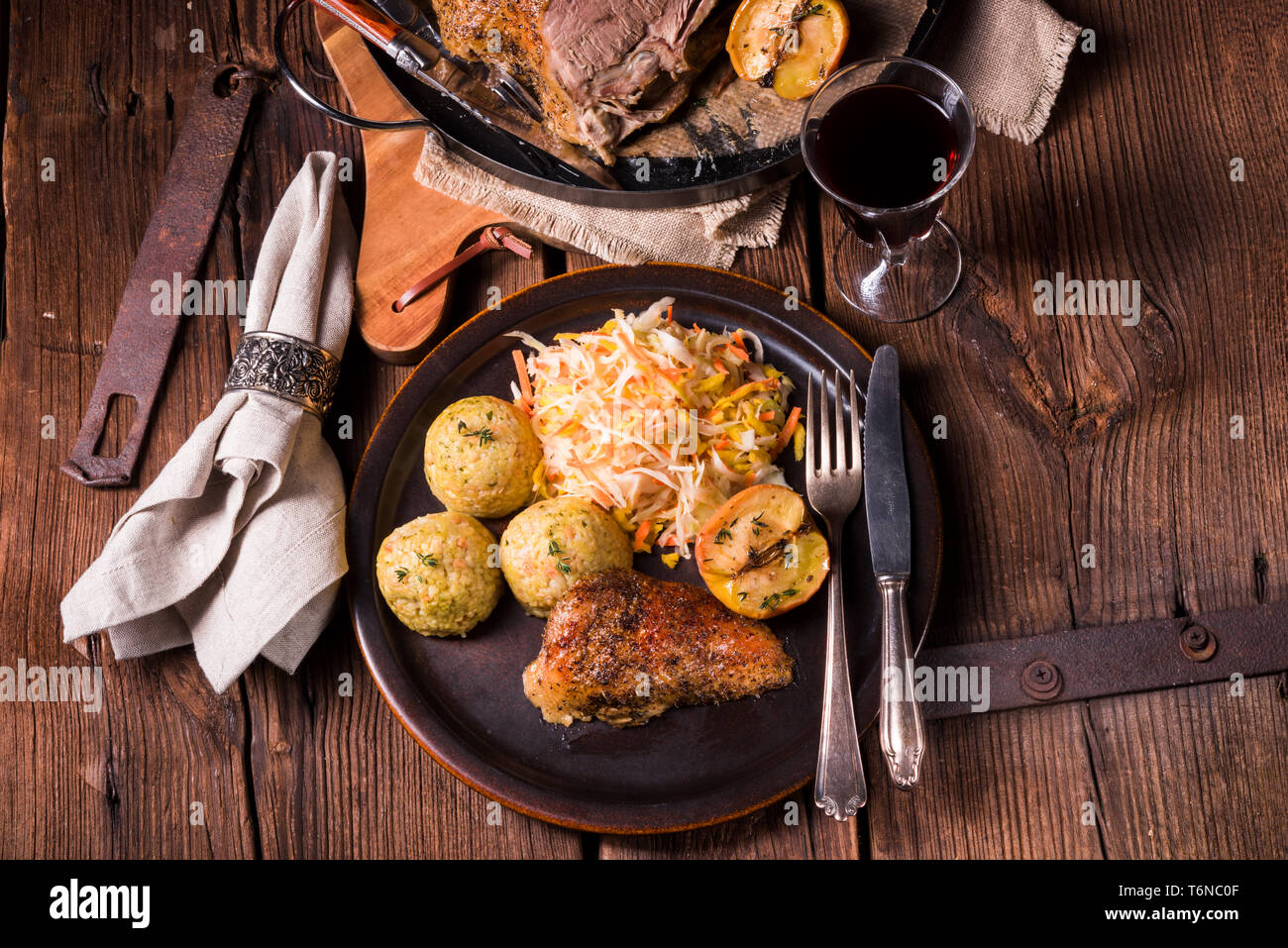 classic and crispy roasted duck with cabbage and dumplings Stock Photo ...