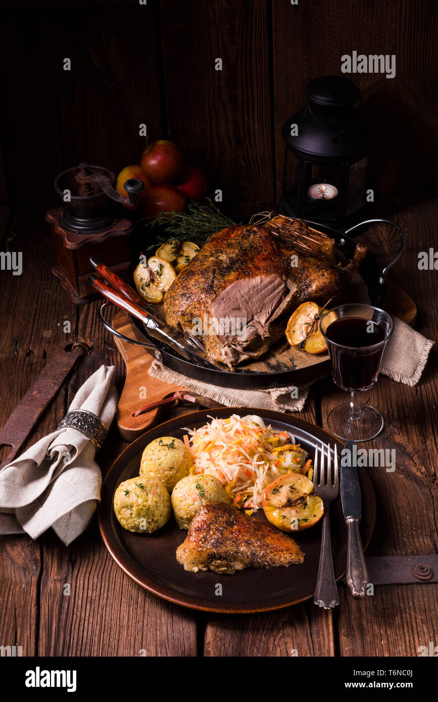 classic and crispy roasted duck with cabbage and dumplings Stock Photo ...