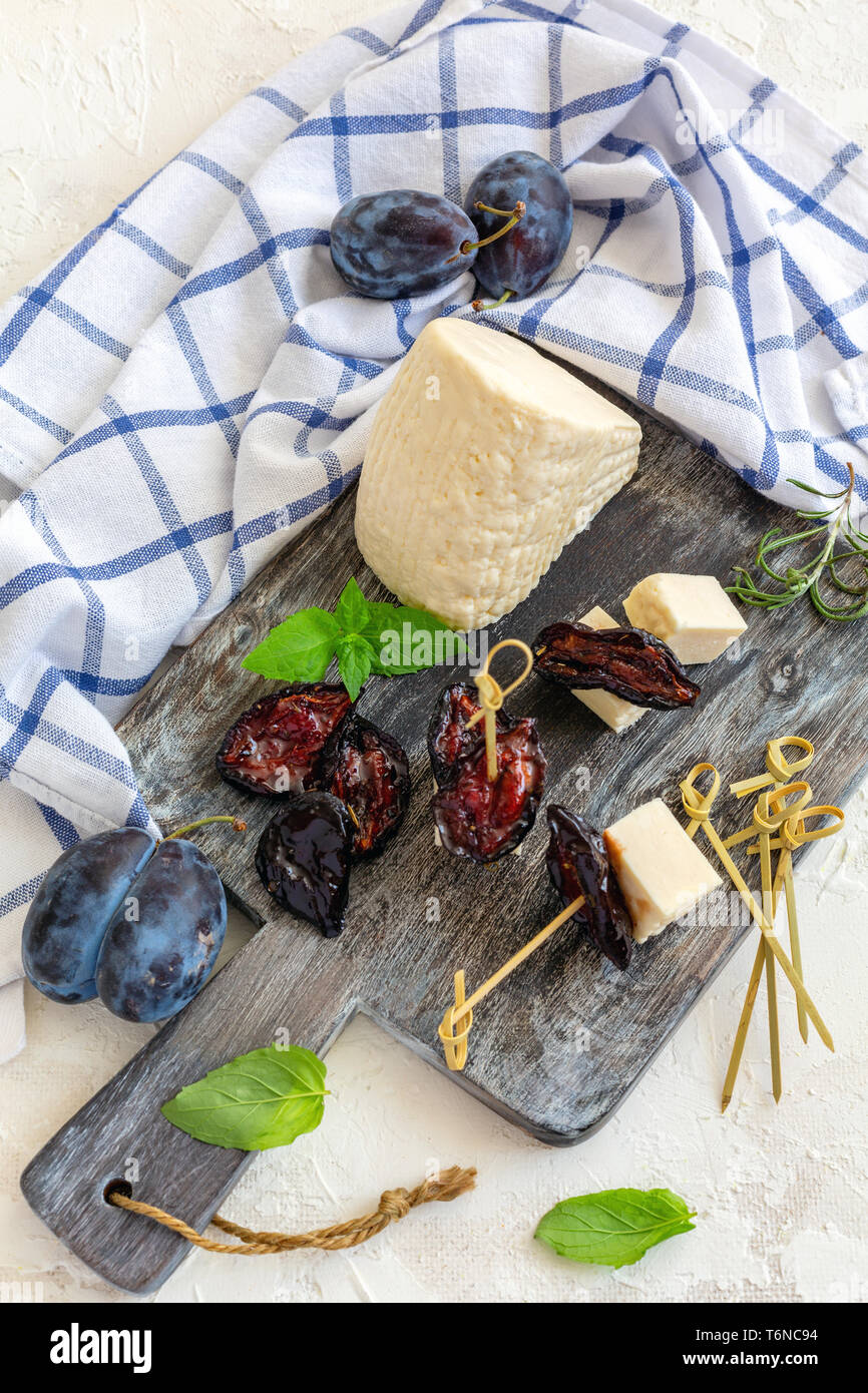 Dried plum with spices and homemade cheese Stock Photo - Alamy