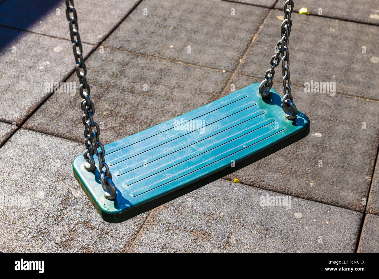 Green Swing on the park Stock Photo - Alamy