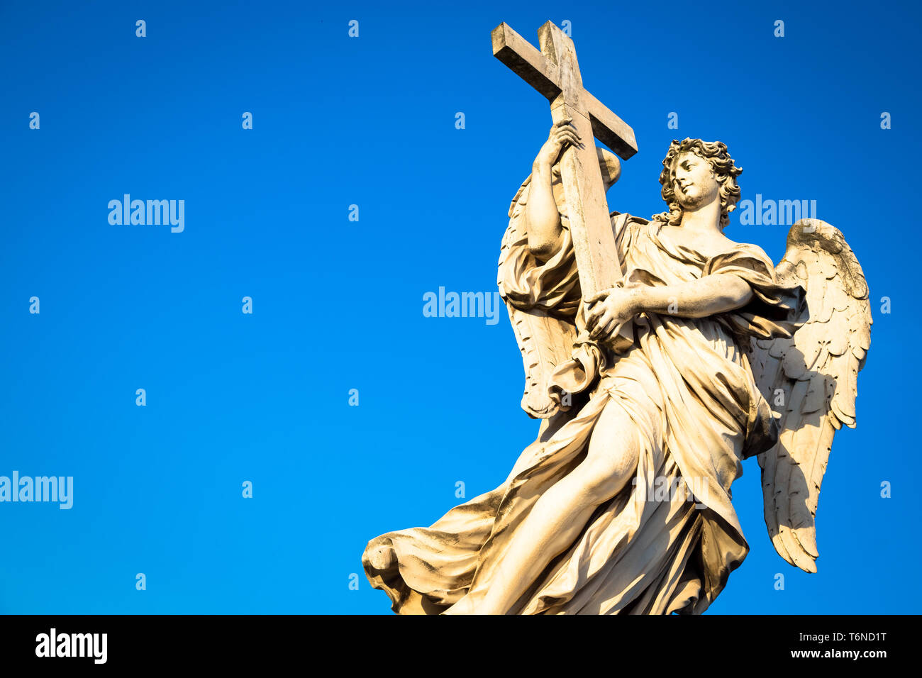Catholic angel with cross Stock Photo - Alamy