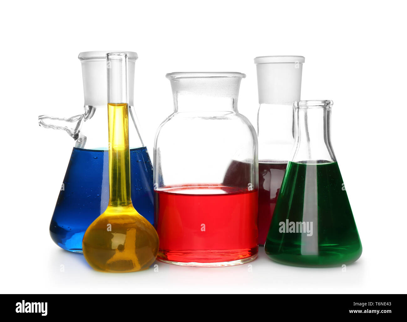 Chemical glassware with colorful samples on white background Stock ...