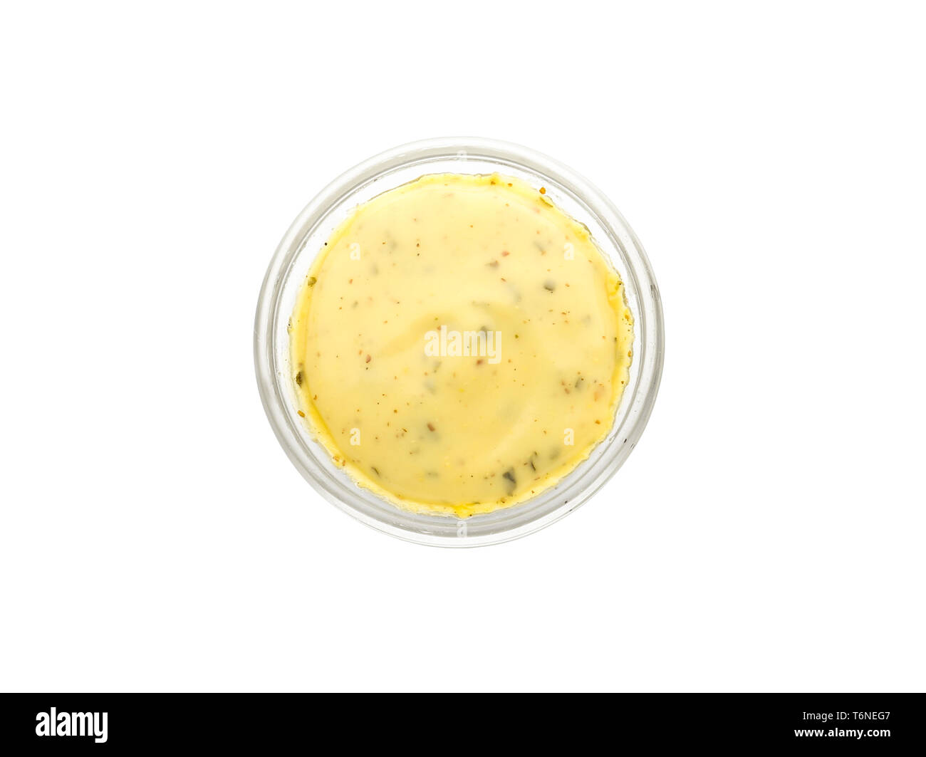 Tasty yellow sauce in bowl on white background Stock Photo - Alamy