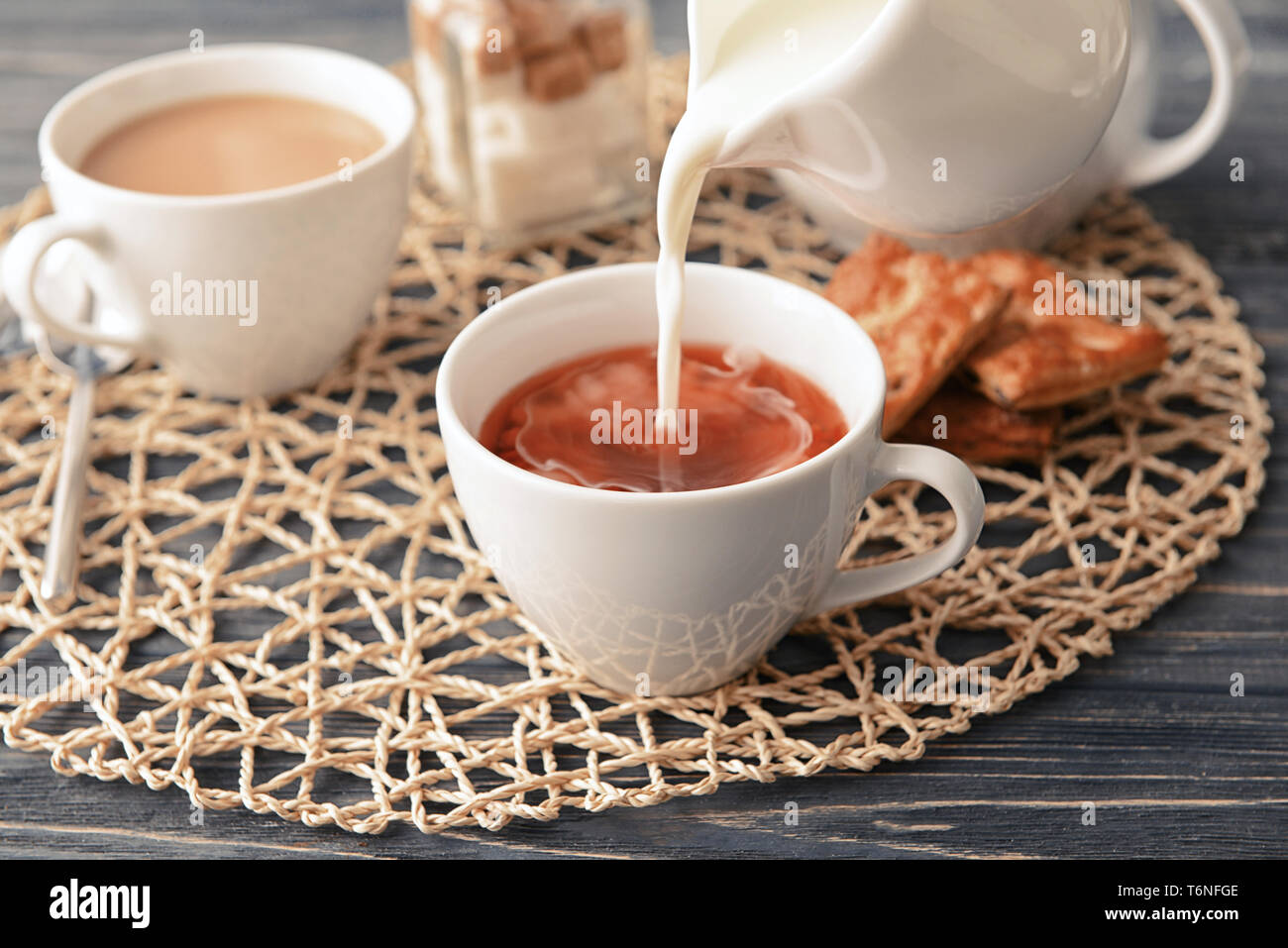 Pouring milk traditional english tea hi-res stock photography and ...