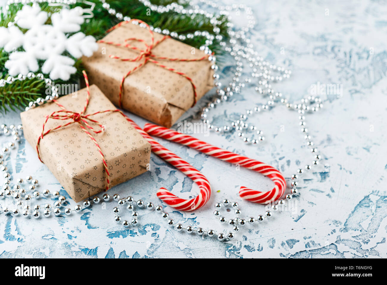 Christmas present with candy canes Stock Photo - Alamy