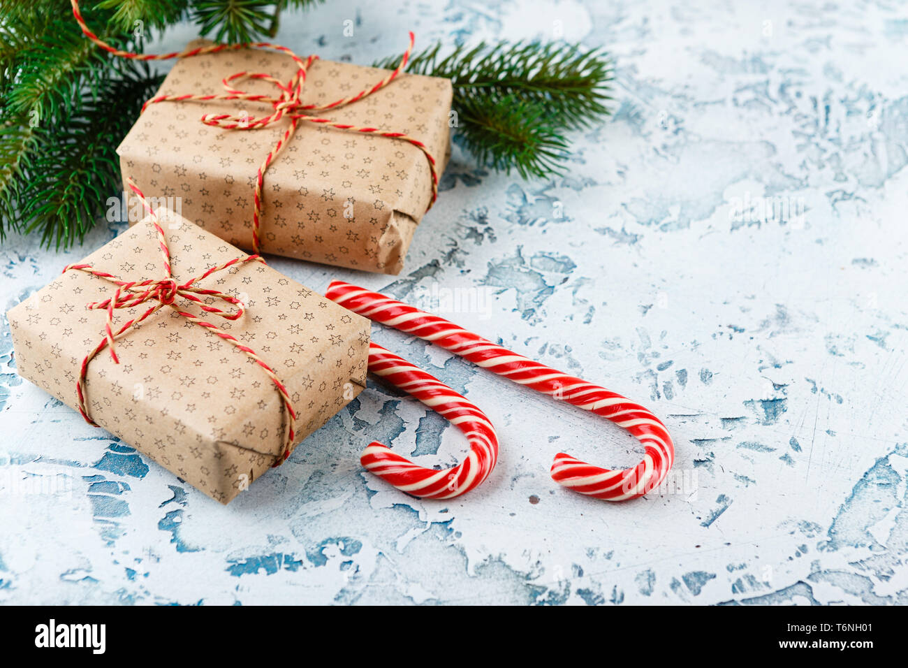 Christmas present with candy canes Stock Photo - Alamy