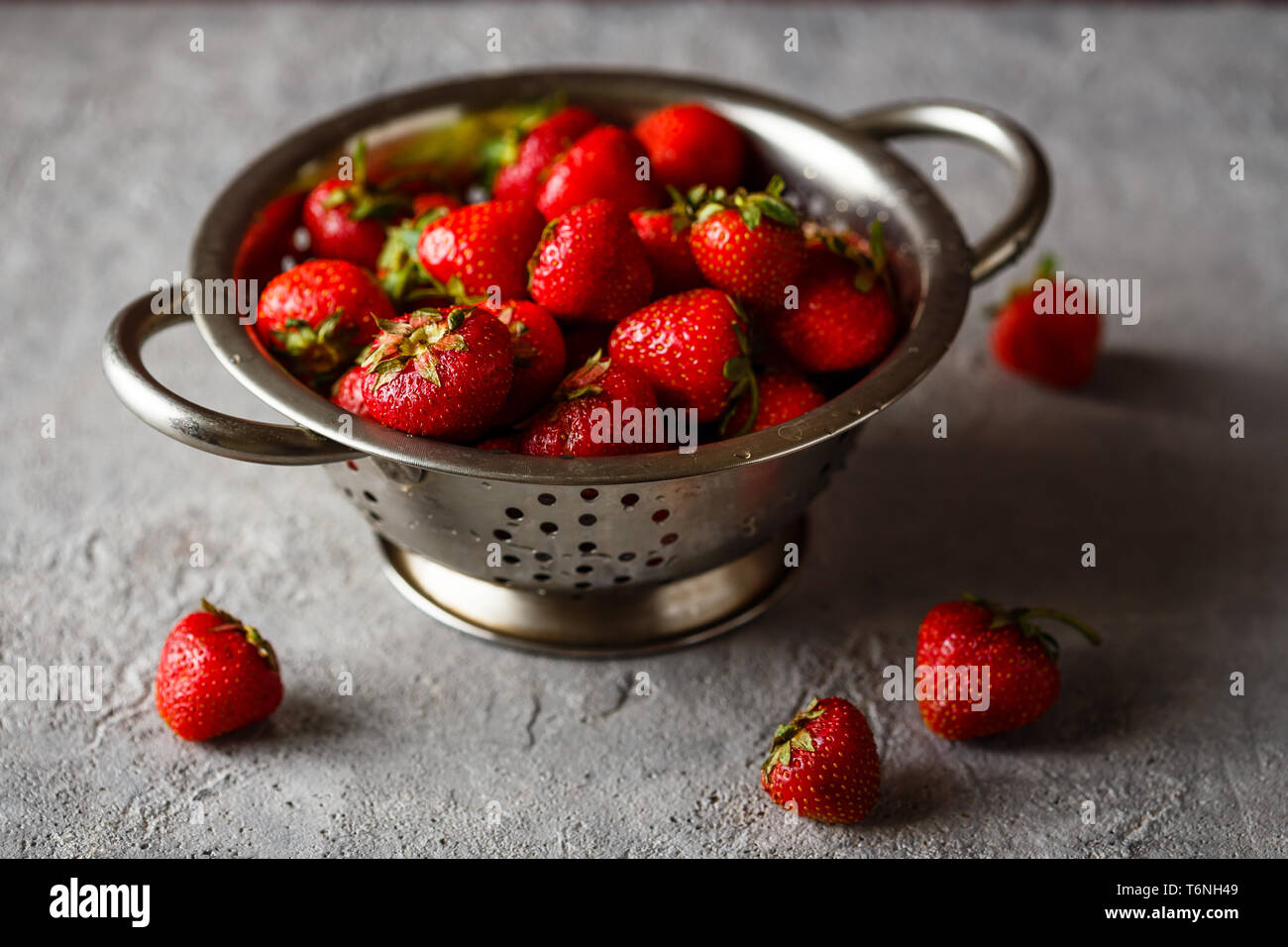 Ripe strawberry in colander Stock Photo - Alamy