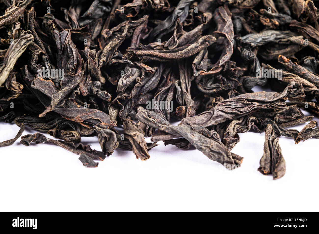 Macro shot of a high quality black tea on white background. Black tea ...