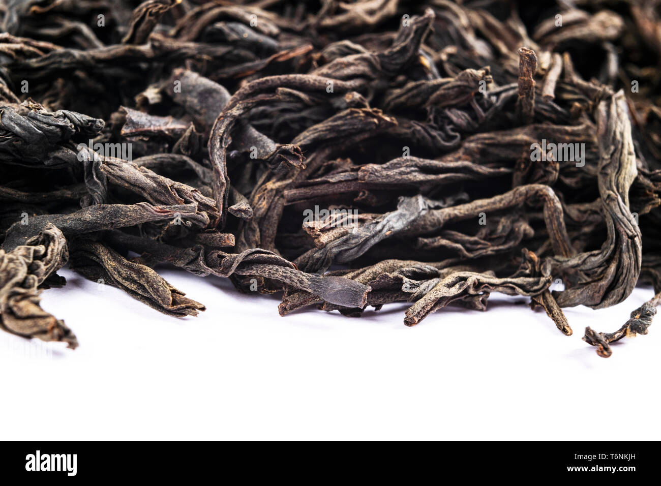 Macro shot of a high quality black tea on white background. Black tea ...
