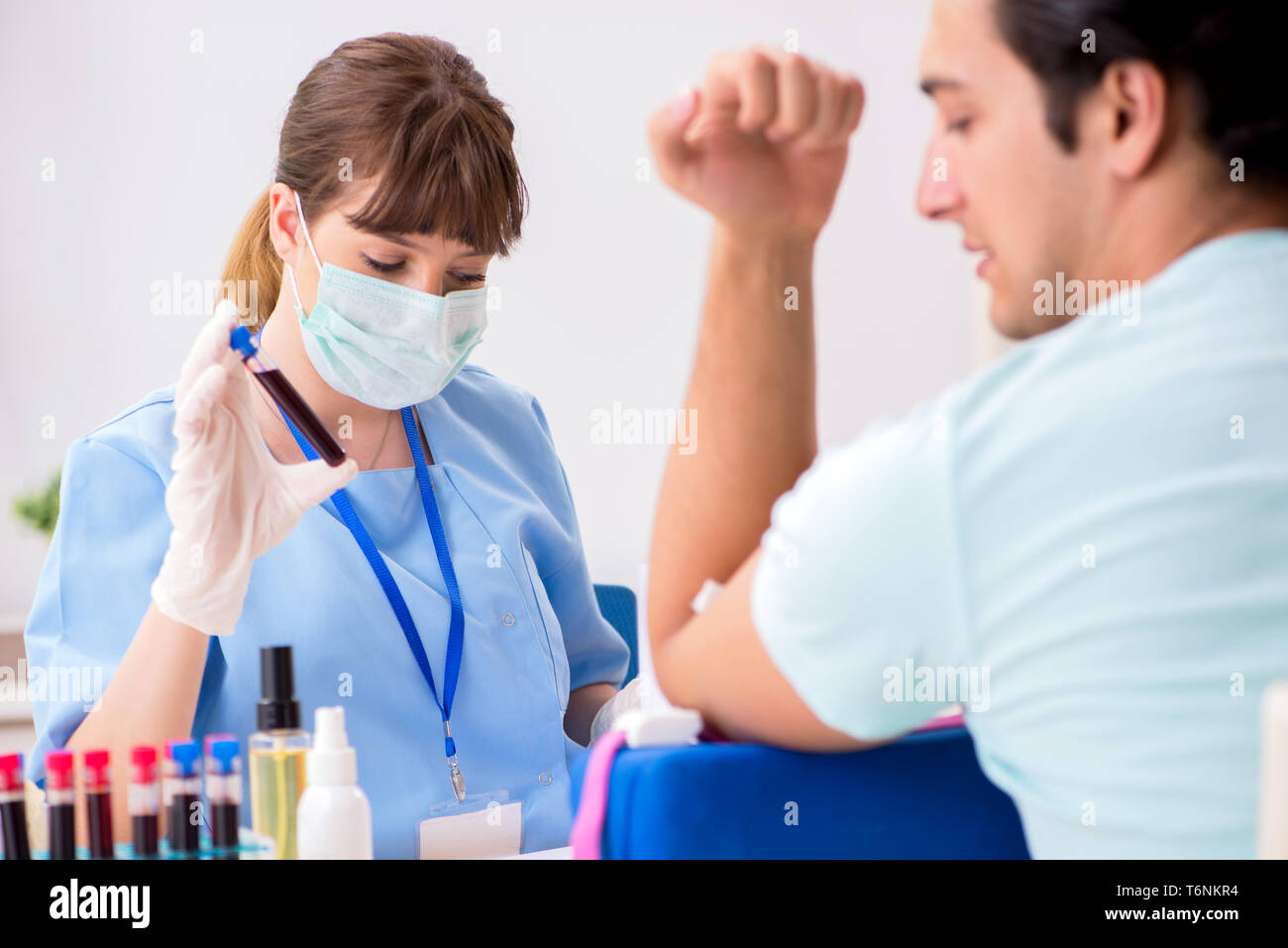 Young patient during blood test sampling procedure Stock Photo - Alamy