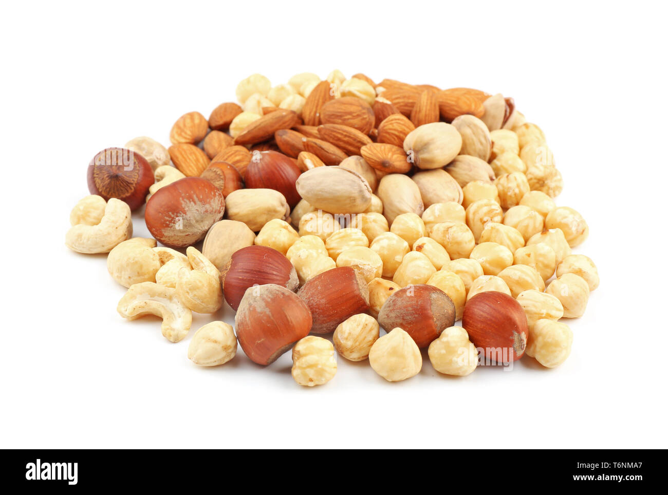 Different nuts on white background Stock Photo - Alamy