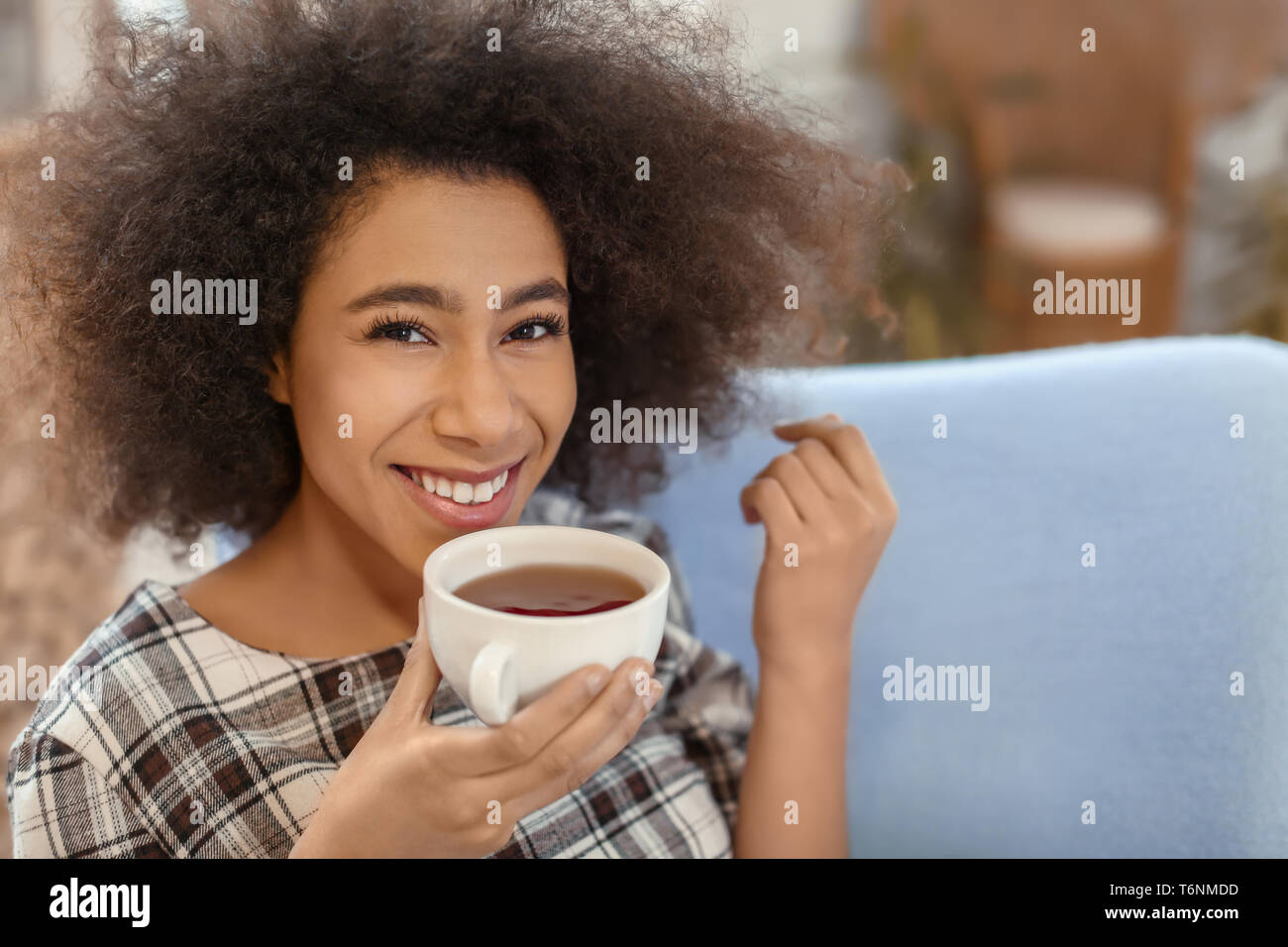 African american woman drinking tea hi-res stock photography and images ...