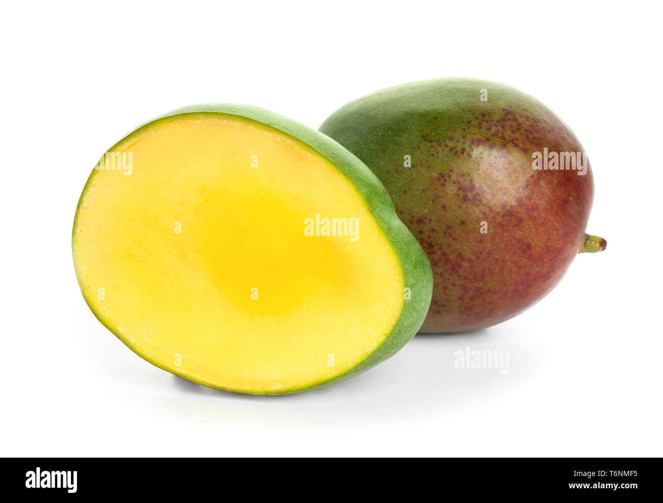 Fresh ripe mangoes on white background Stock Photo - Alamy