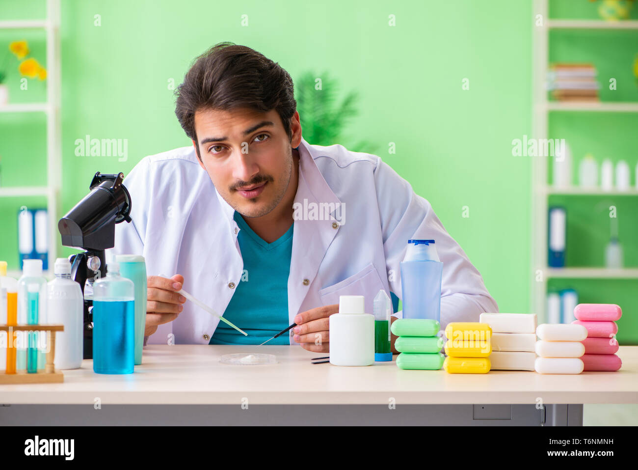 The chemist testing soap in the lab Stock Photo - Alamy