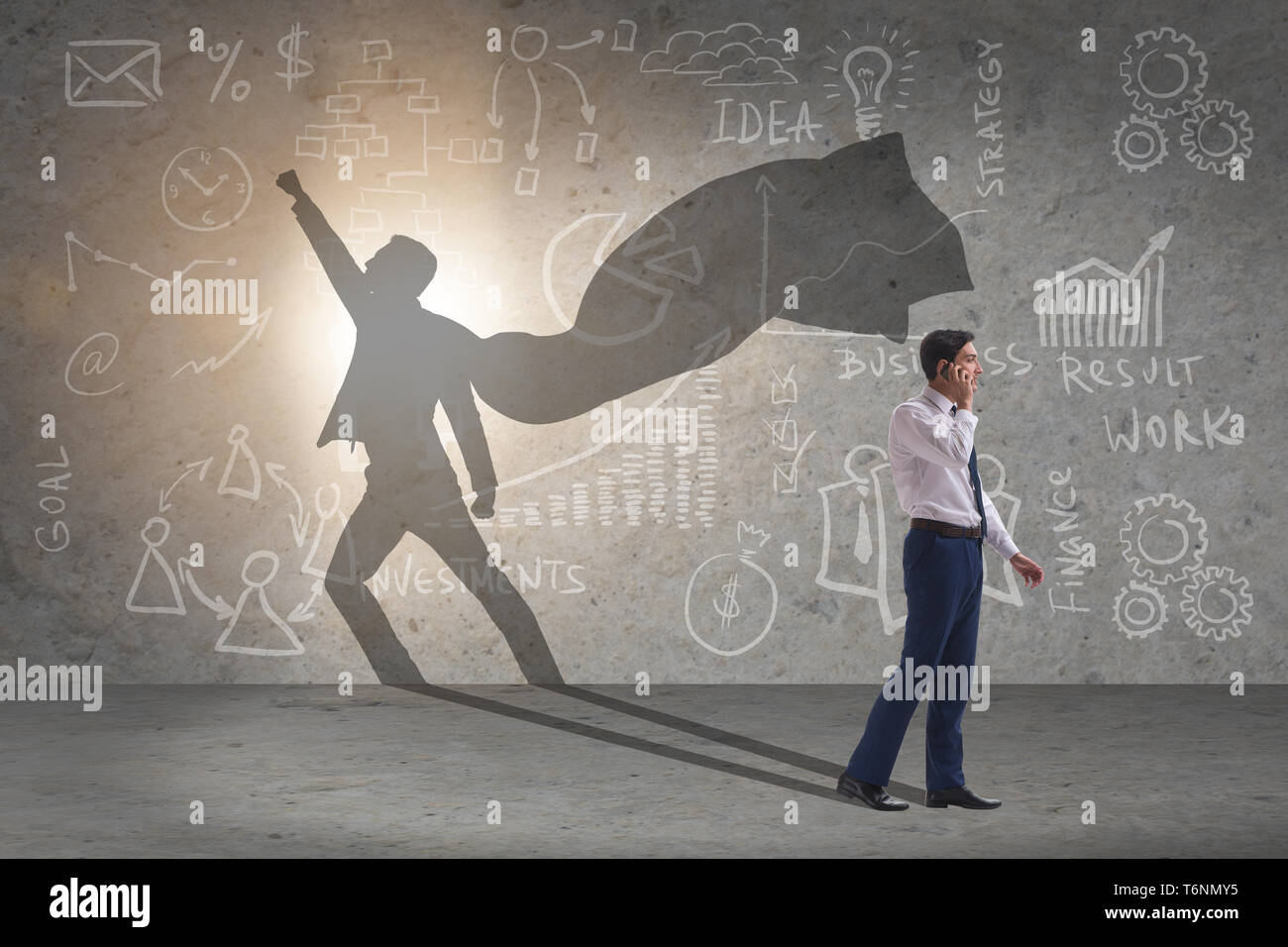 The businessman and his shadow in business concept Stock Photo - Alamy
