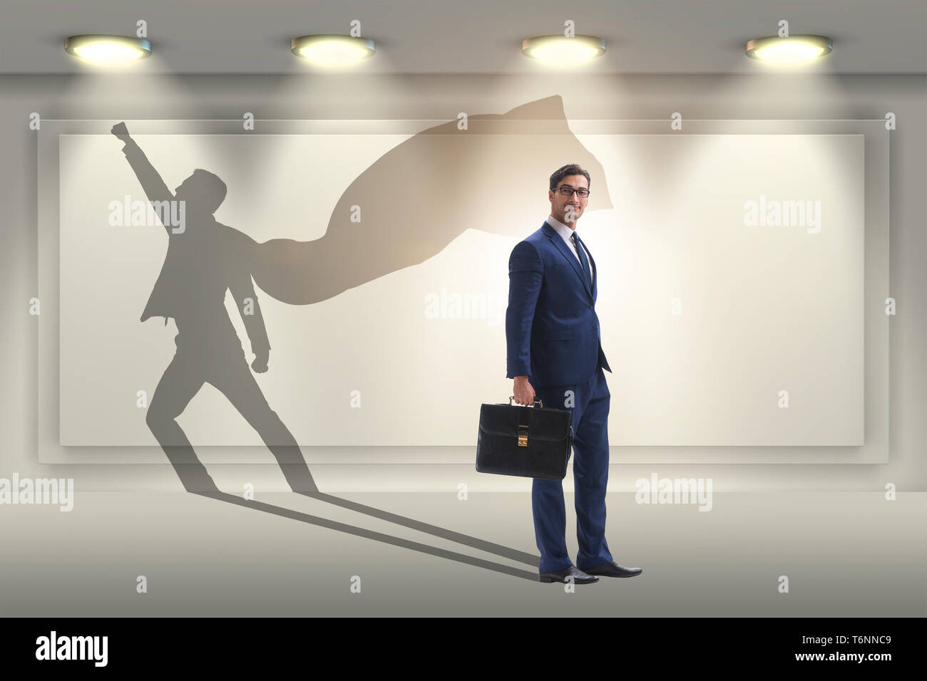 The businessman and his shadow in business concept Stock Photo - Alamy
