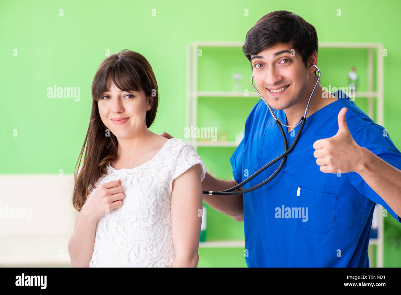 The female patient visiting male doctor in medical concept Stock Photo ...