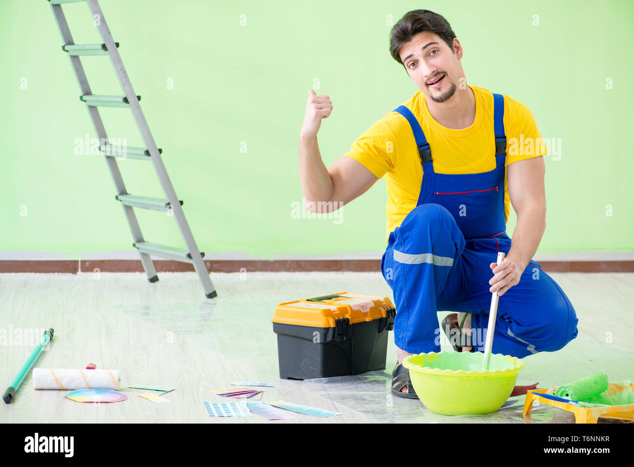 The young man doing home renovation Stock Photo - Alamy