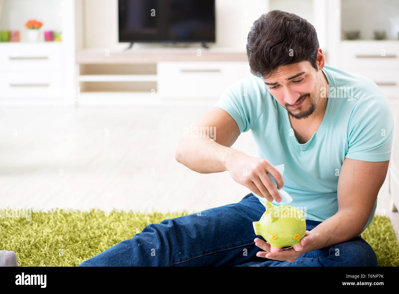 The young man struggling with personal finance and bills Stock Photo ...