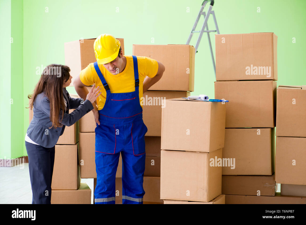 The woman boss and man contractor working with boxes delivery Stock ...