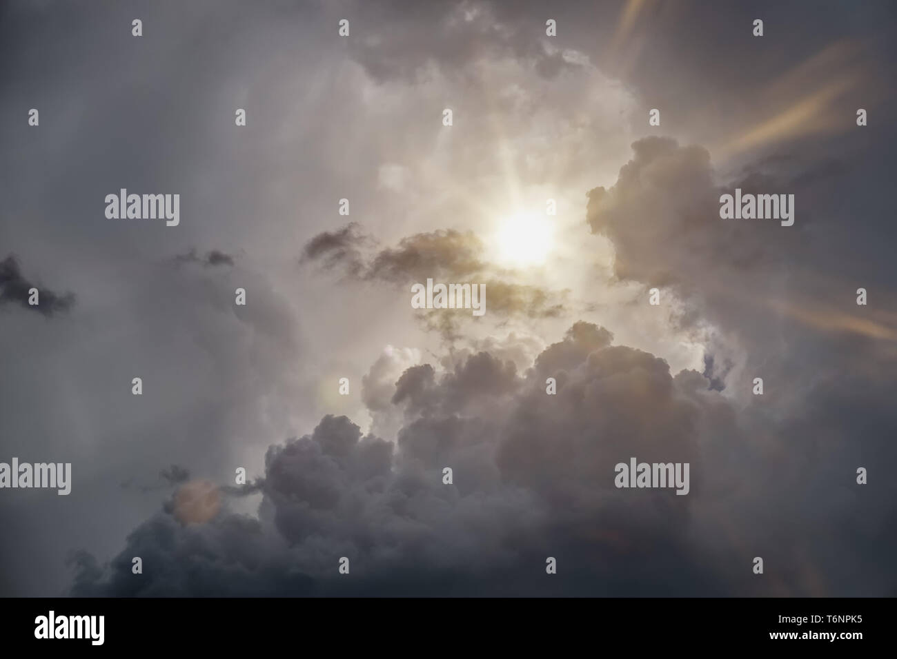 dramatic grey sky with sun Stock Photo - Alamy