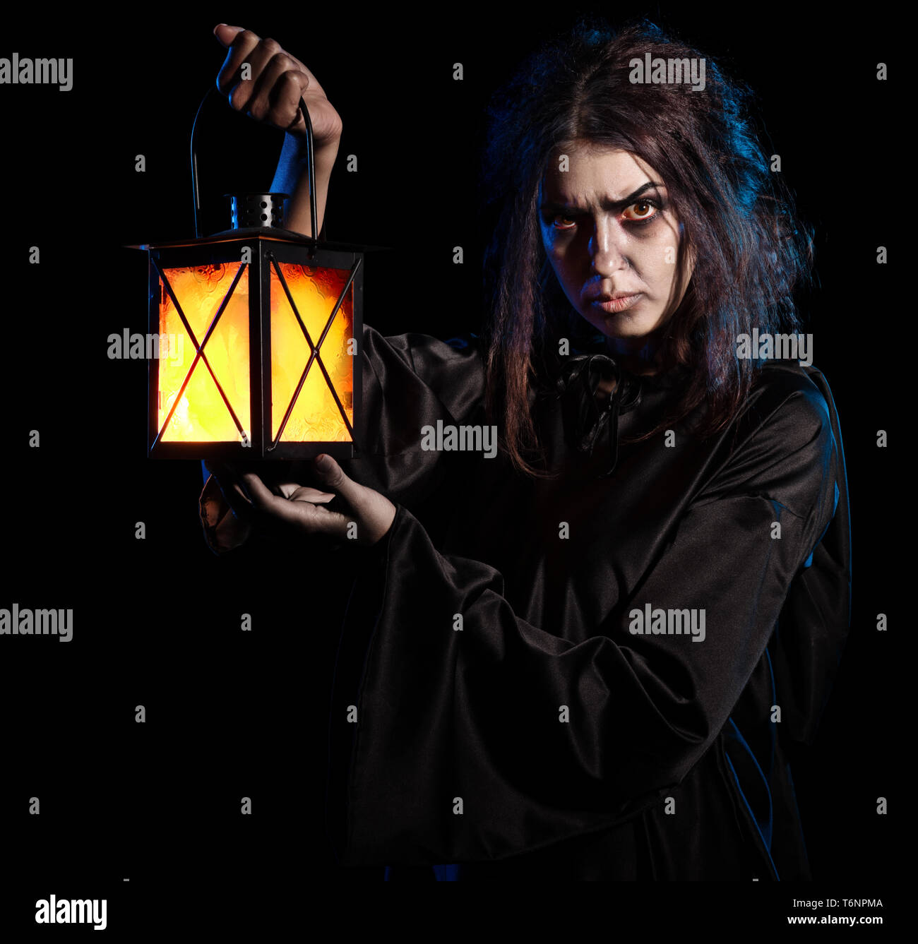 Scary witch isolated on black version Stock Photo - Alamy