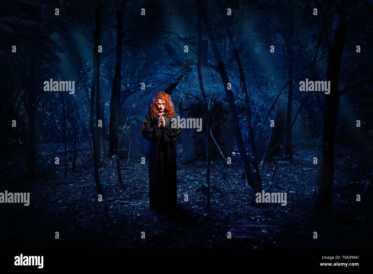 Young witch night forest hi-res stock photography and images - Alamy