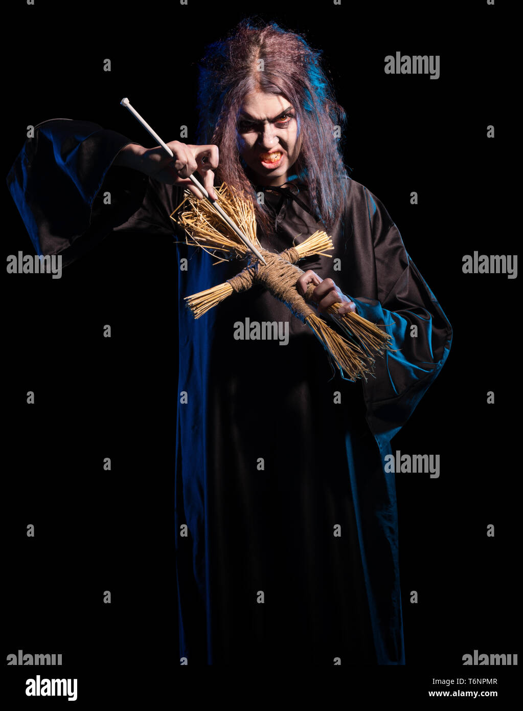 Scary witch isolated on black version Stock Photo - Alamy