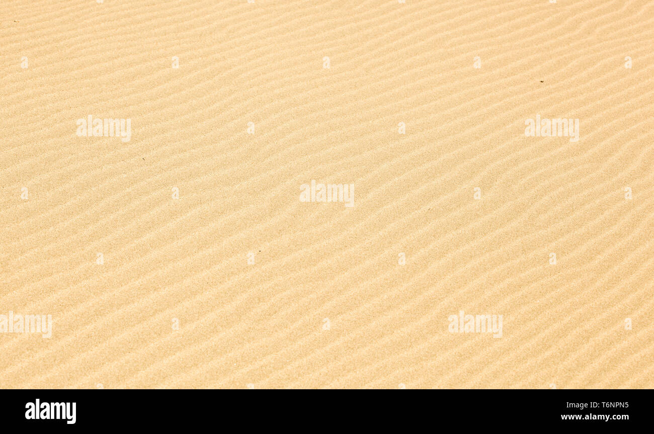 Sand background texture Stock Photo - Alamy
