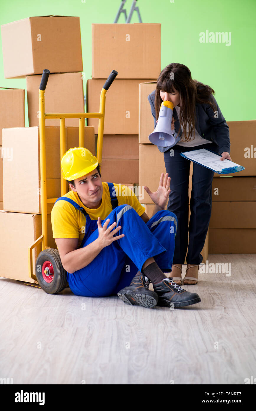Woman boss and man contractor working with boxes delivery Stock Photo ...
