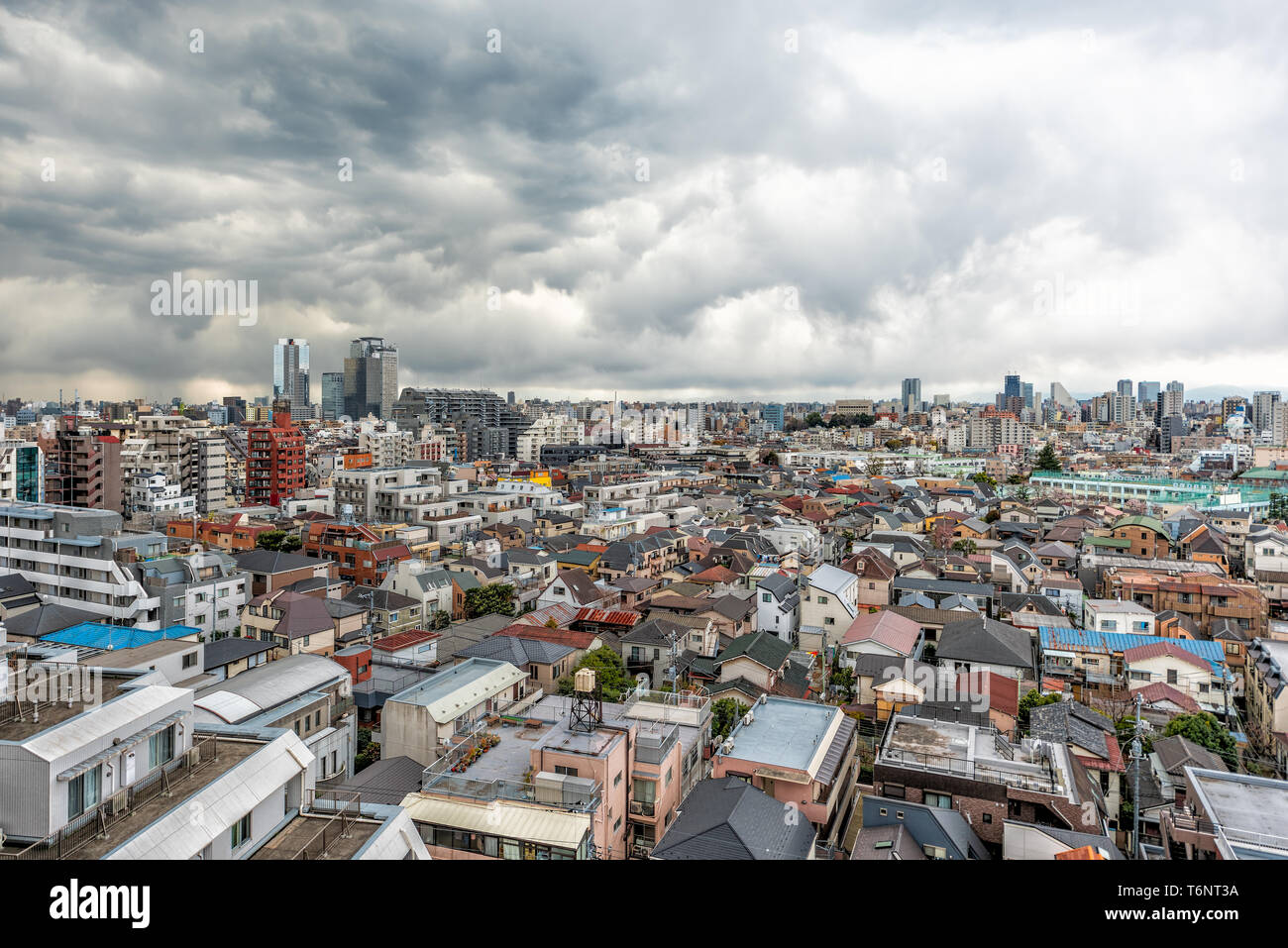 Shinjuku, Tokyo dark gloomy hdr cityscape with view apartment buildings ...