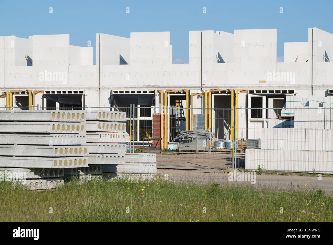 Building family houses with sand-lime bricks at a construction site ...