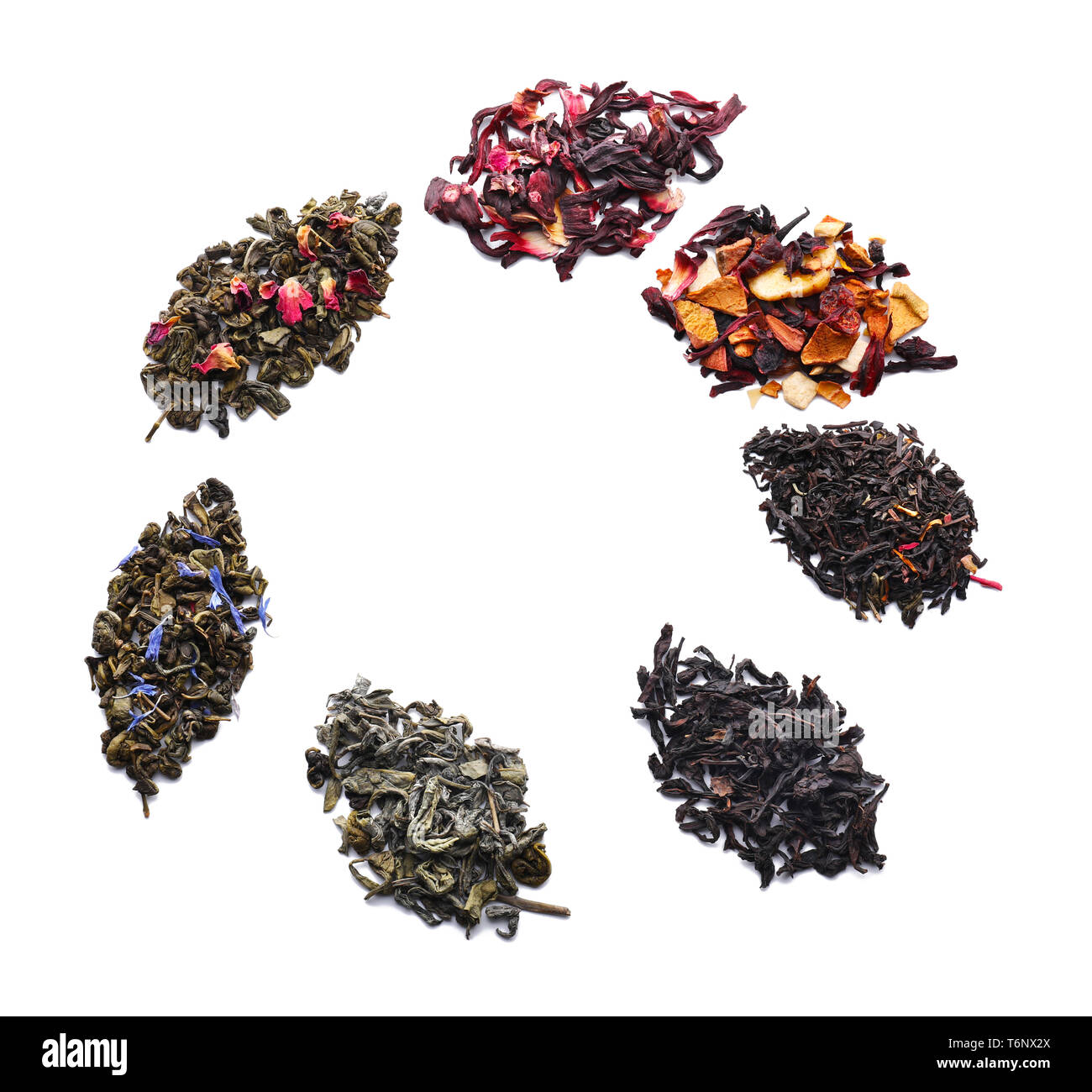 Composition made of different types of dry tea on white background ...