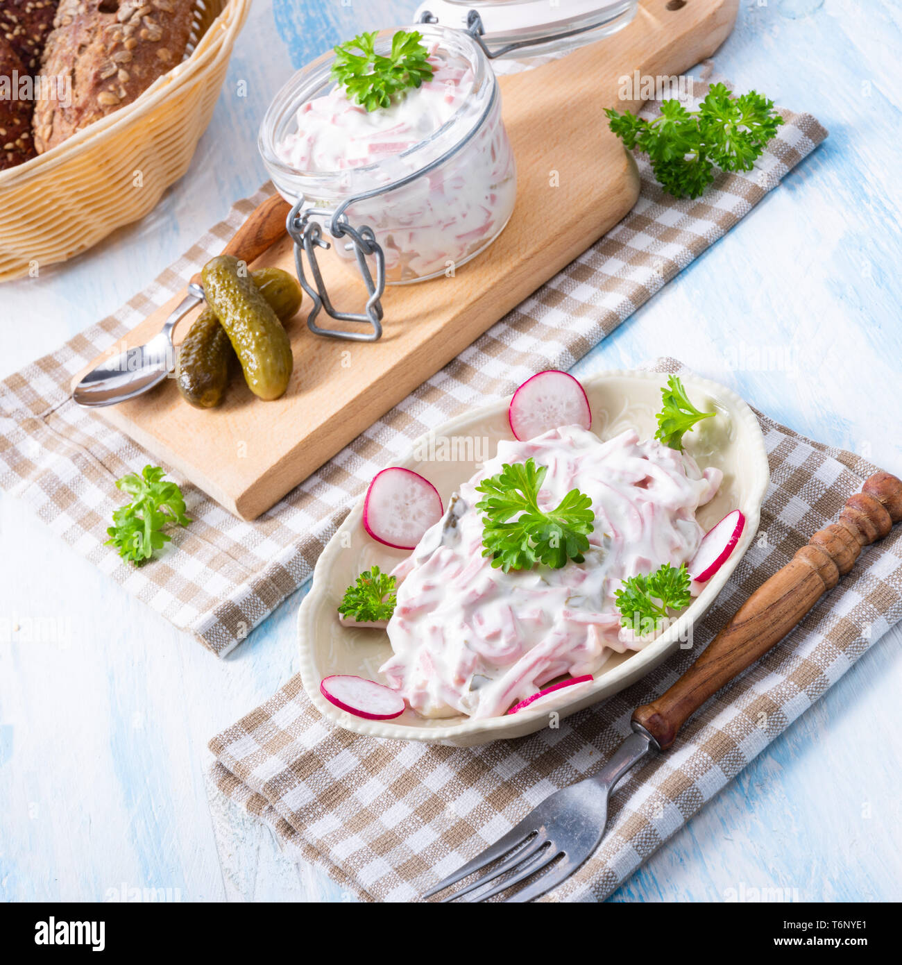 delicious homemade meat salad with mayonnaise and cucumber Stock Photo ...