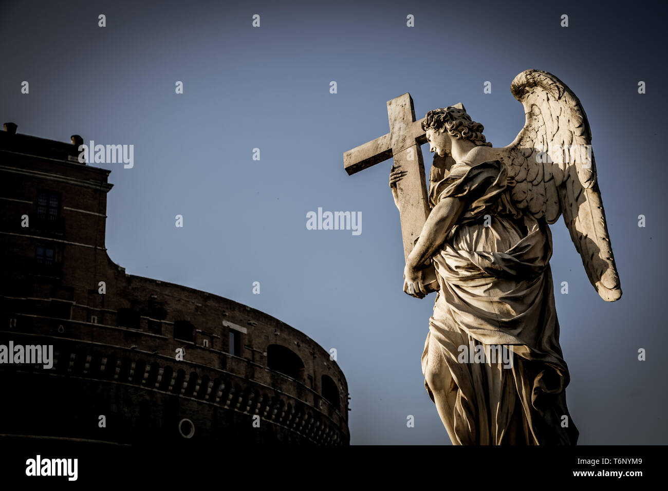 Catholic angel with cross Stock Photo - Alamy
