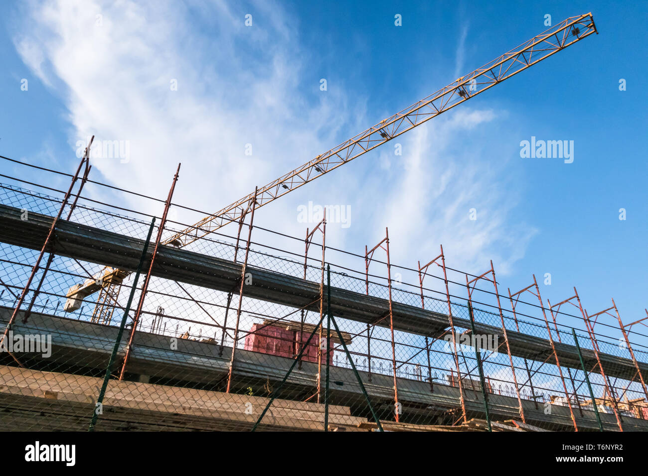 Crane lifting construction material hi-res stock photography and images ...
