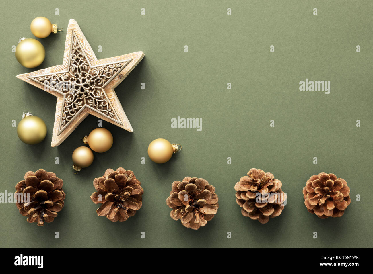 Christmas decoration background with pine cones and a star Stock Photo ...