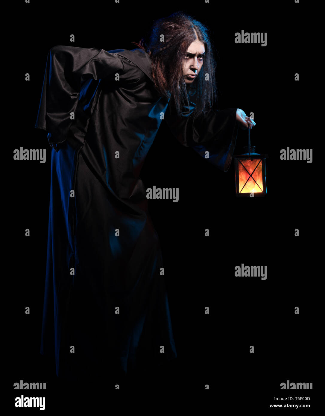 Scary witch isolated on black version Stock Photo - Alamy