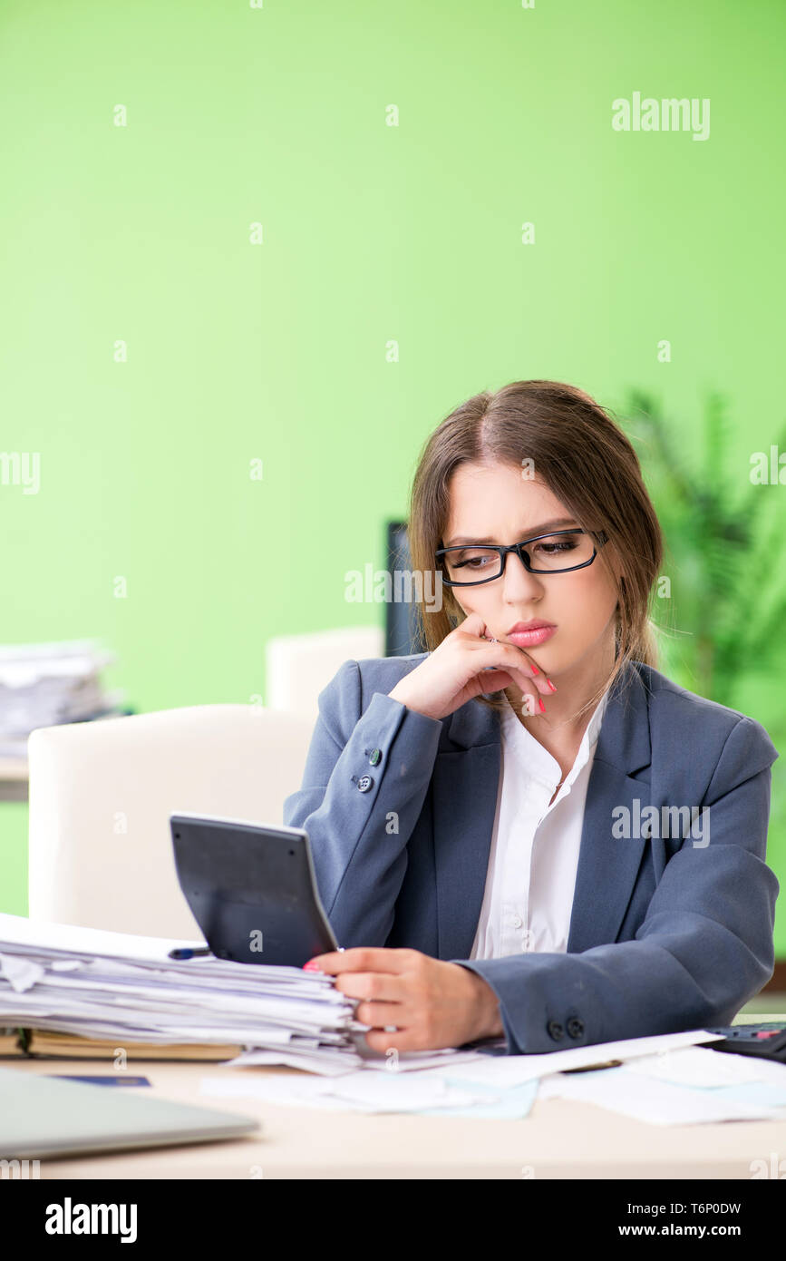 Female financial manager working in the office Stock Photo - Alamy