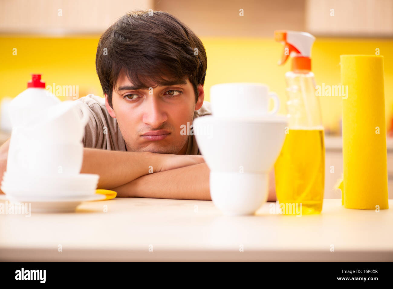 Man washing dishes at home Stock Photo - Alamy