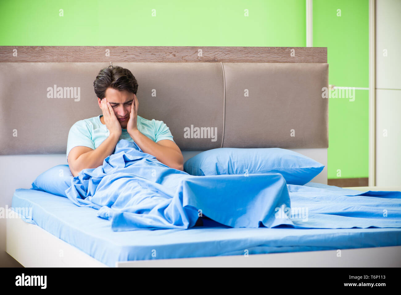 Man suffering from sleeping disorder and insomnia Stock Photo - Alamy