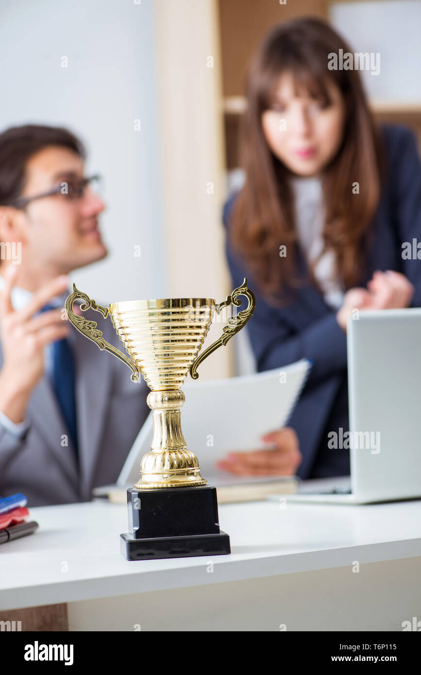 Concept of teamwork with prize Stock Photo - Alamy