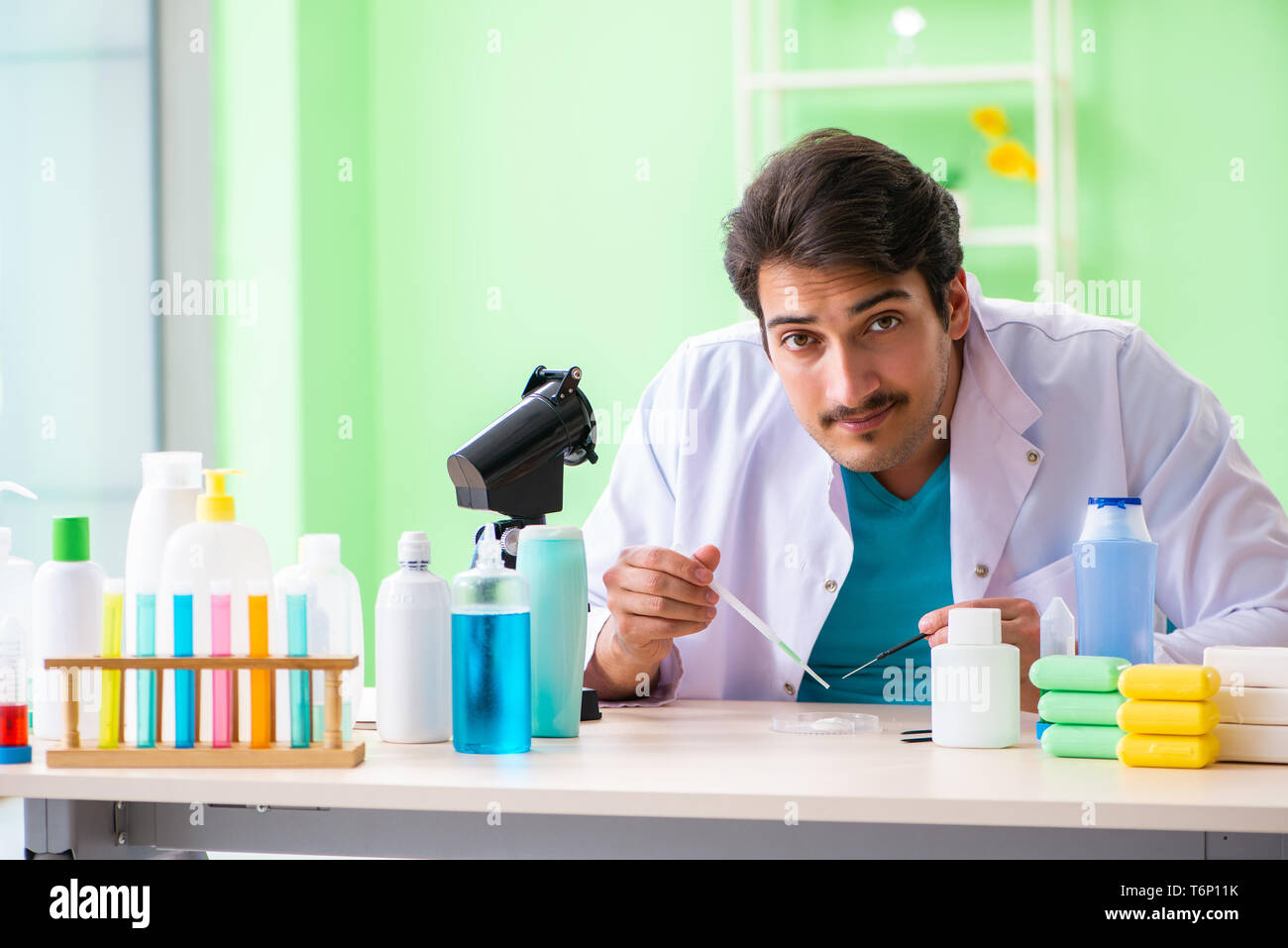 Chemist testing soap in the lab Stock Photo - Alamy
