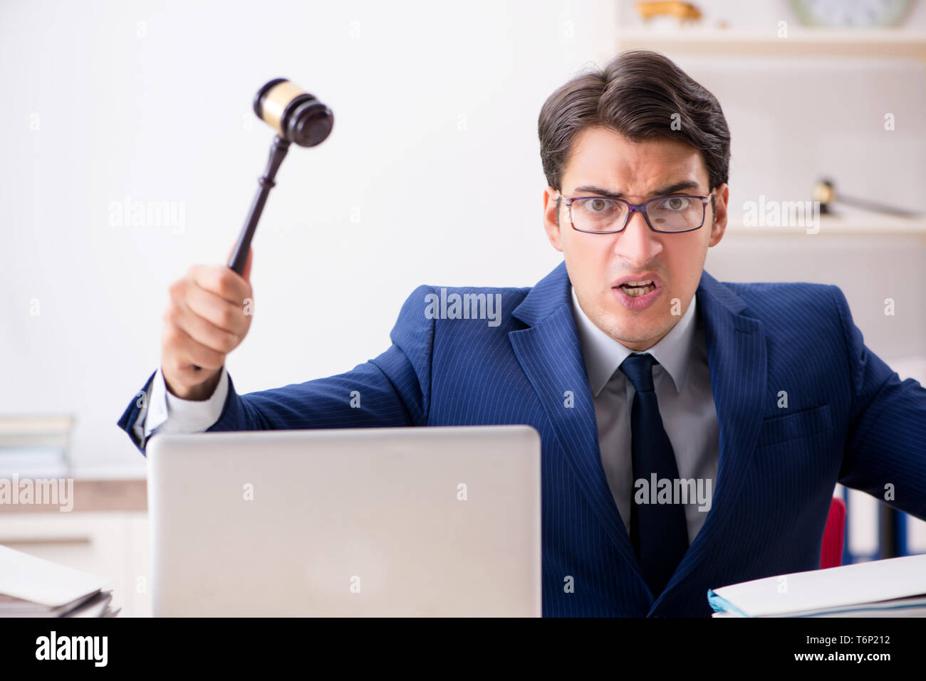 Young handsome judge working in court Stock Photo - Alamy