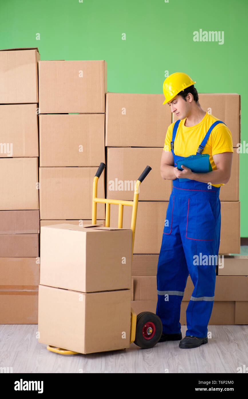 Man contractor working with boxes delivery Stock Photo - Alamy