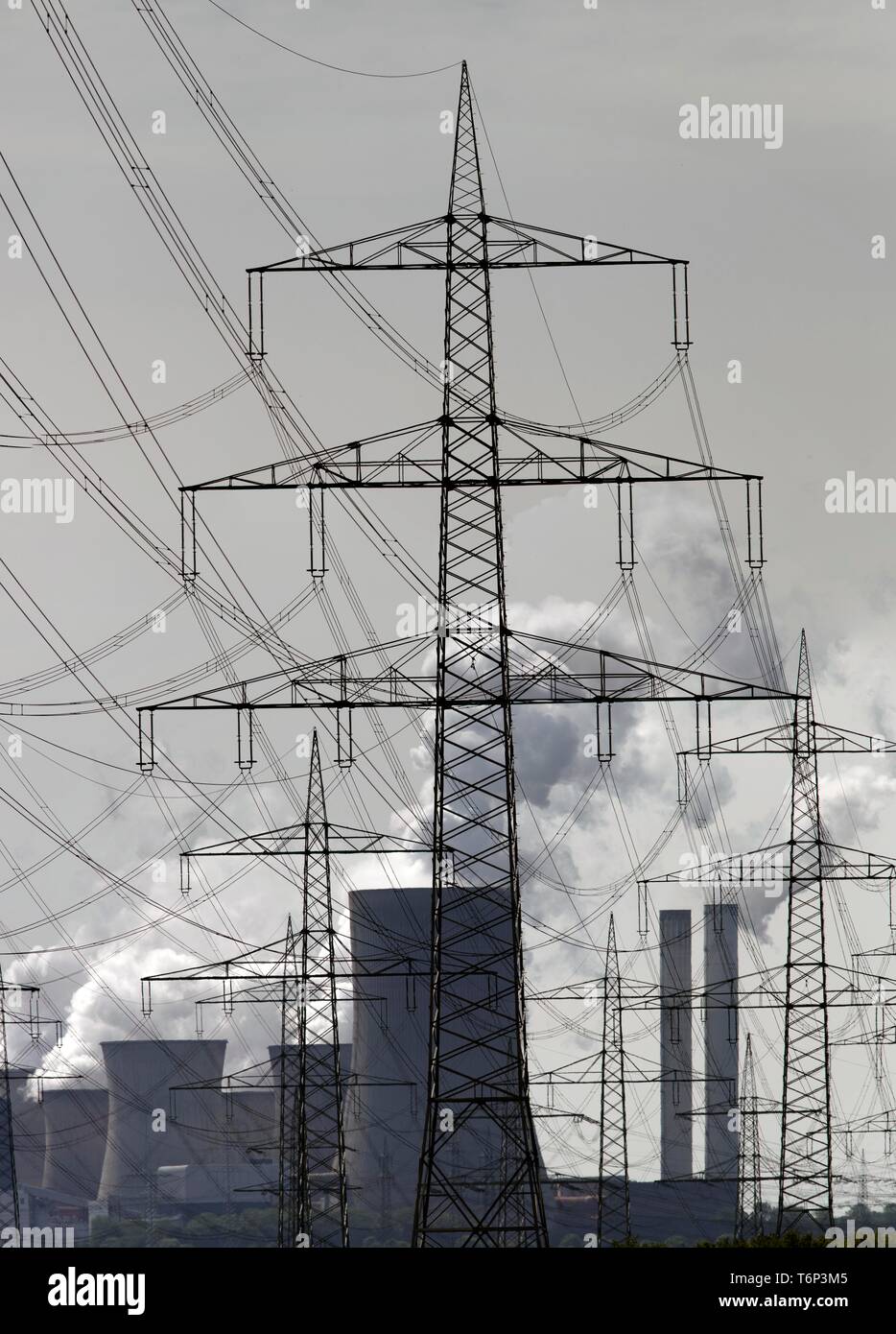 Generation of electricity, a coal power station and power poles, North ...